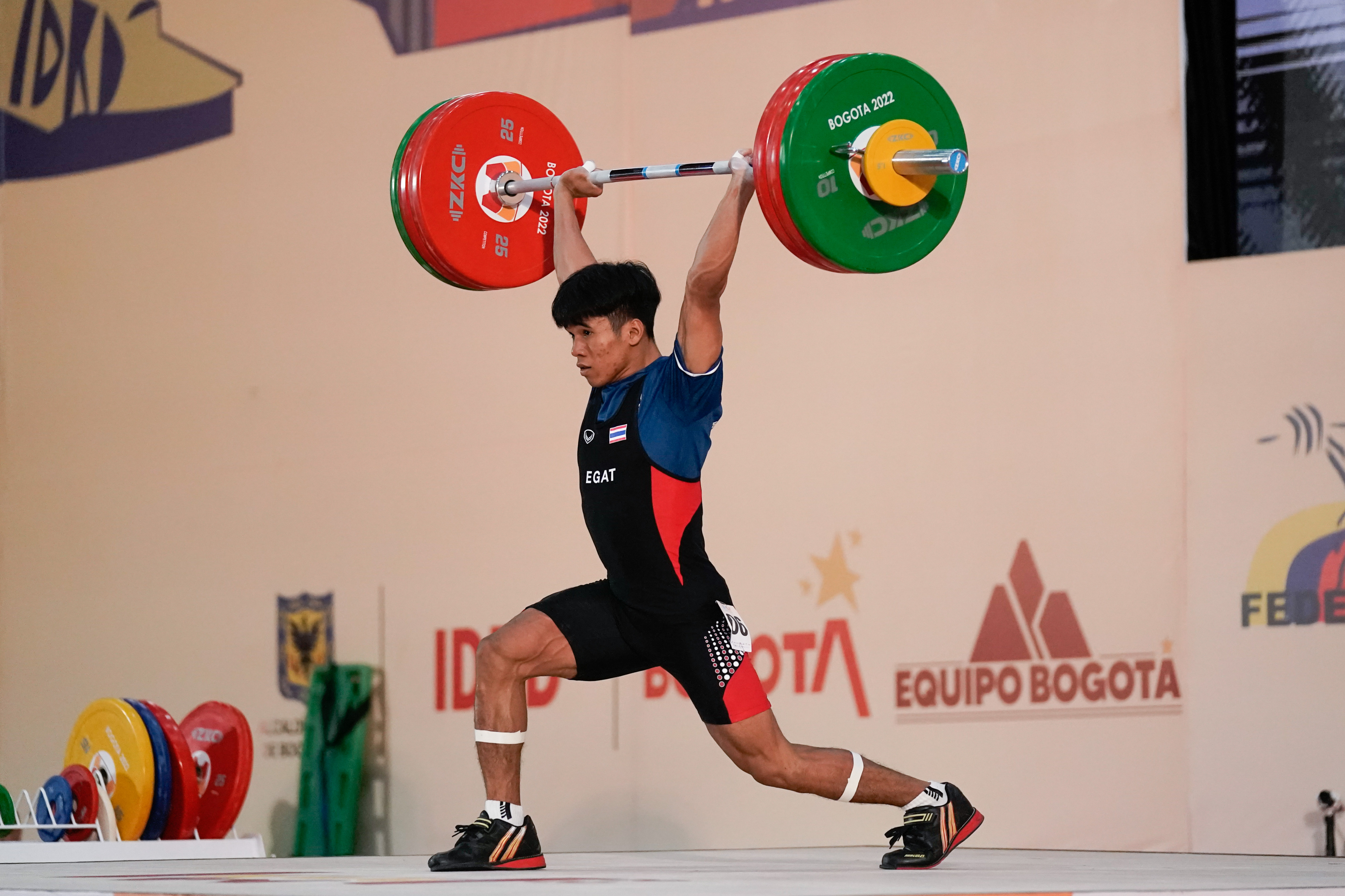 Gold for China’s Jiang – and Chanu earns cheers for great escape ...