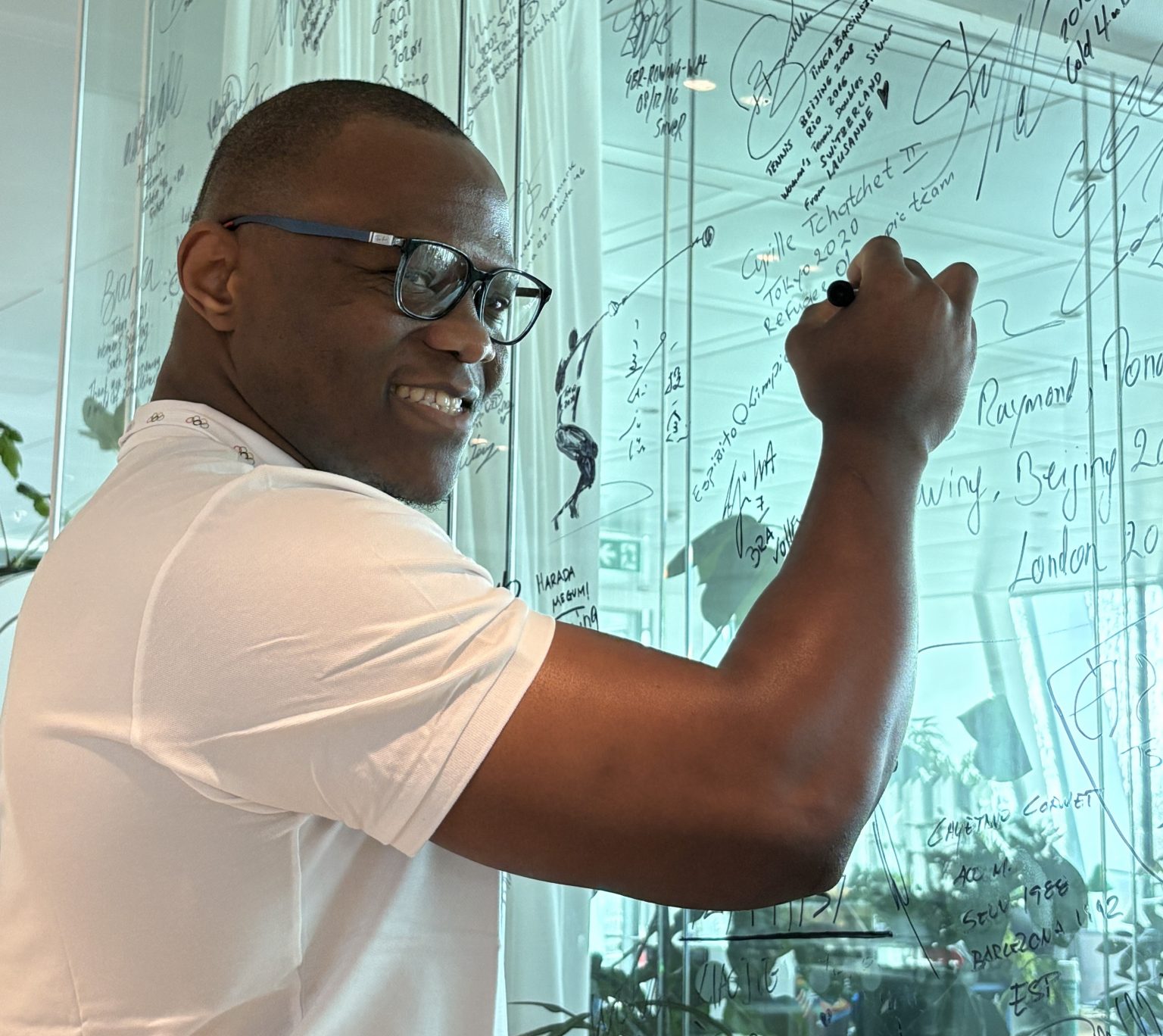 Cyrille Tchatchet: first lifter to sign the IOC Olympian Wall ...